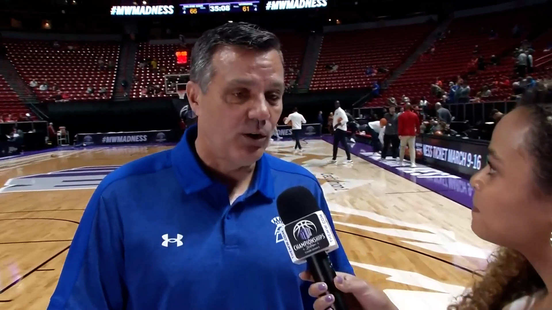 Coach Tim Miles and Sadaidriene Hall with the Mountain West Network ...